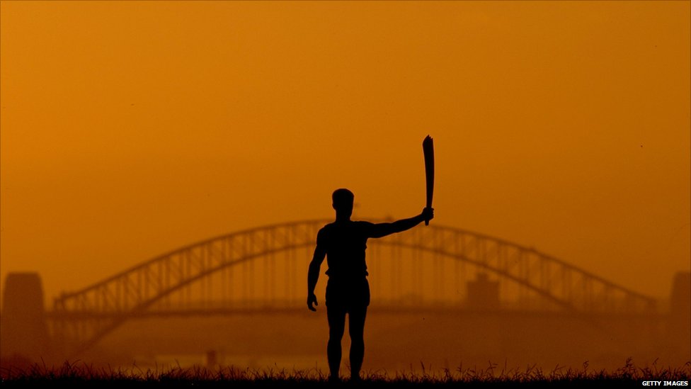 The 2000 Sydney Olympic Games Torch Silhouetted Against - Olympic Torch ...