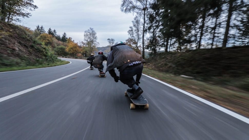 Time Lapse Photography Of 3 Person Doing Downhill On - Downhill ...