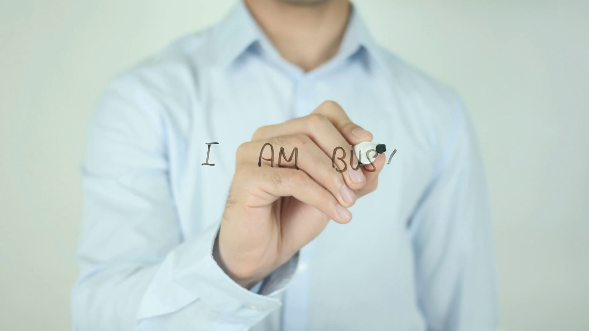 I Am Busy, Writing On Transparent Screen Stock Video - Guy Writing On ...